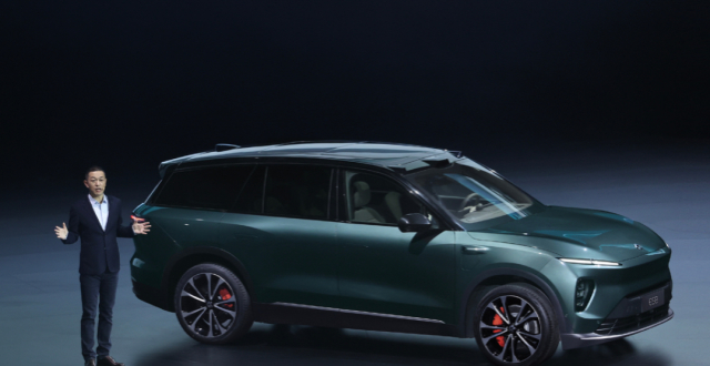 蔚来轿跑SUV EC7亮相！电动尾翼3.8s破百，售价48.8万起_腾讯新闻