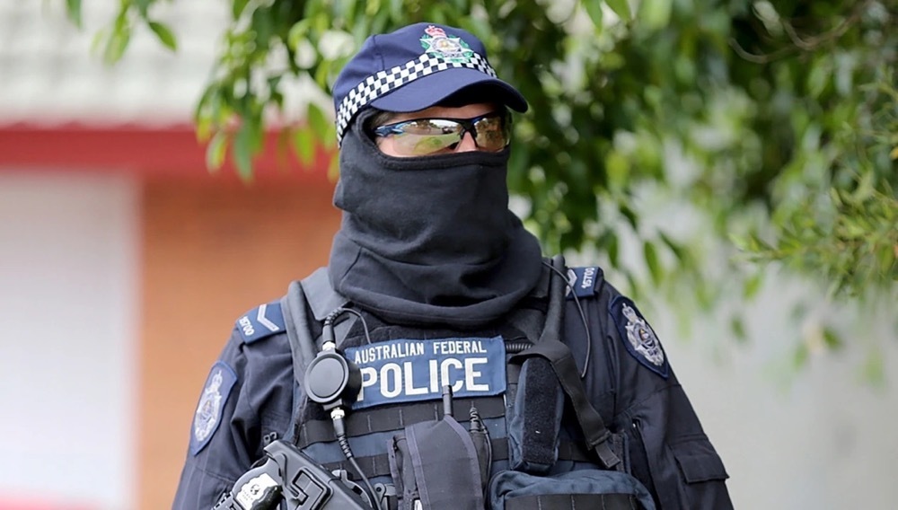 悉尼商人被指出售国家机密，WeChat被警方检查_腾讯新闻