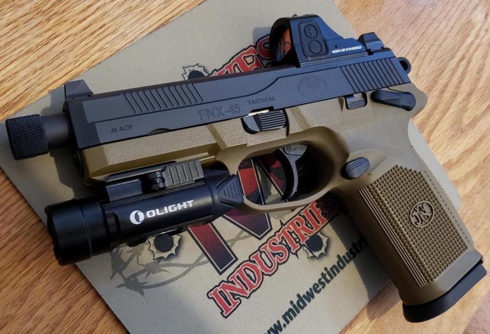 FNX-45：现代战术手枪的典范之作 让使用者爱不释手_腾讯新闻