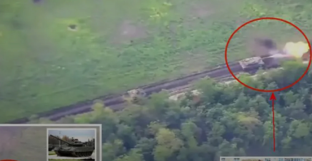 外媒：乌军“豹-2A6”与俄军T-80BV坦克交火视频流出，“画面首次出现”_腾讯新闻