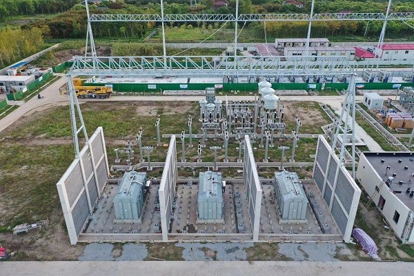 崇明500千伏输变电工程首组主变顺利完成就位_腾讯新闻