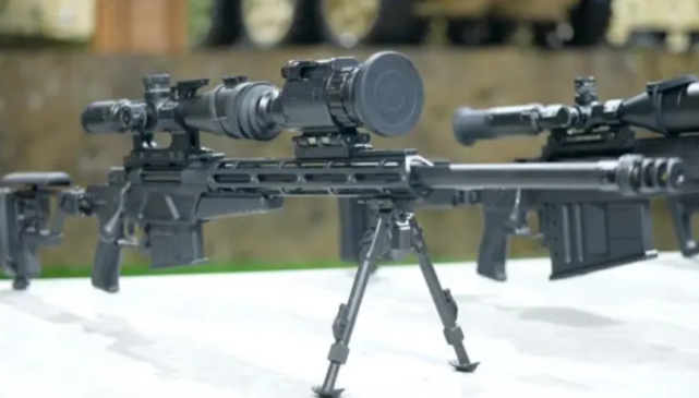 20式枪族亮相航展：基本采用5.8mm口径，含盖步冲机狙等班用枪械_腾讯新闻