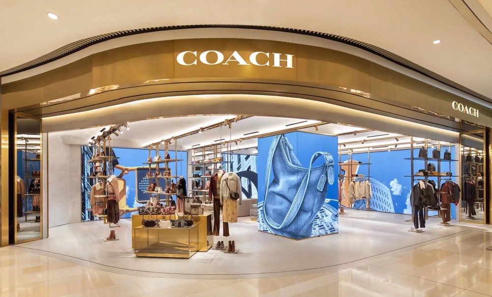 COACH中国区高管杨葆焱：2023年将于深圳、汕头等城市开出新店｜高管侃新年_腾讯新闻