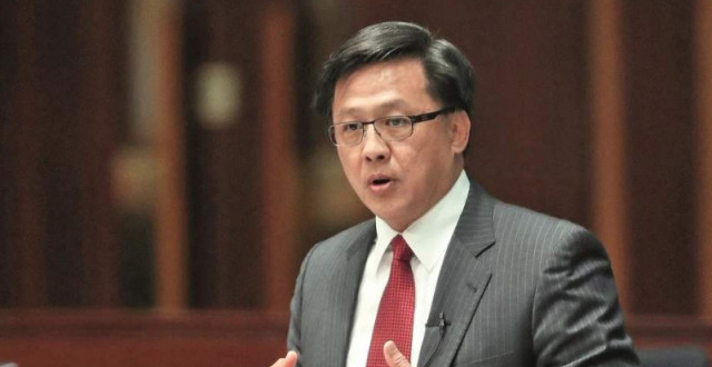 轻判“港独”的香港法官，被喷漆骂“狗官”_腾讯新闻