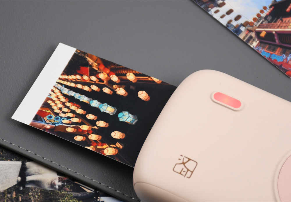 汉印CP2100便携照片打印机评测：内置电池，还能打印AR照片_腾讯新闻