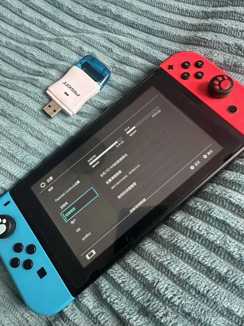 任天堂switch游戏机换tf卡教程详解，ns数字版游戏无需重新下载_腾讯新闻
