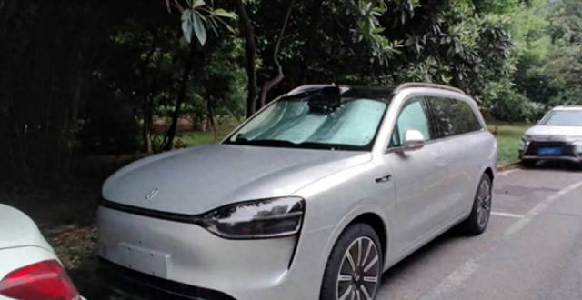 问界M9实车再曝光，轴距3110mm，外观个性时尚，配贯穿式大连屏_腾讯新闻